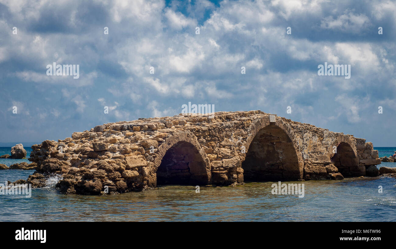 Stone arch bridge on water. Stone arch bridge on water Stock Photo - Alamy