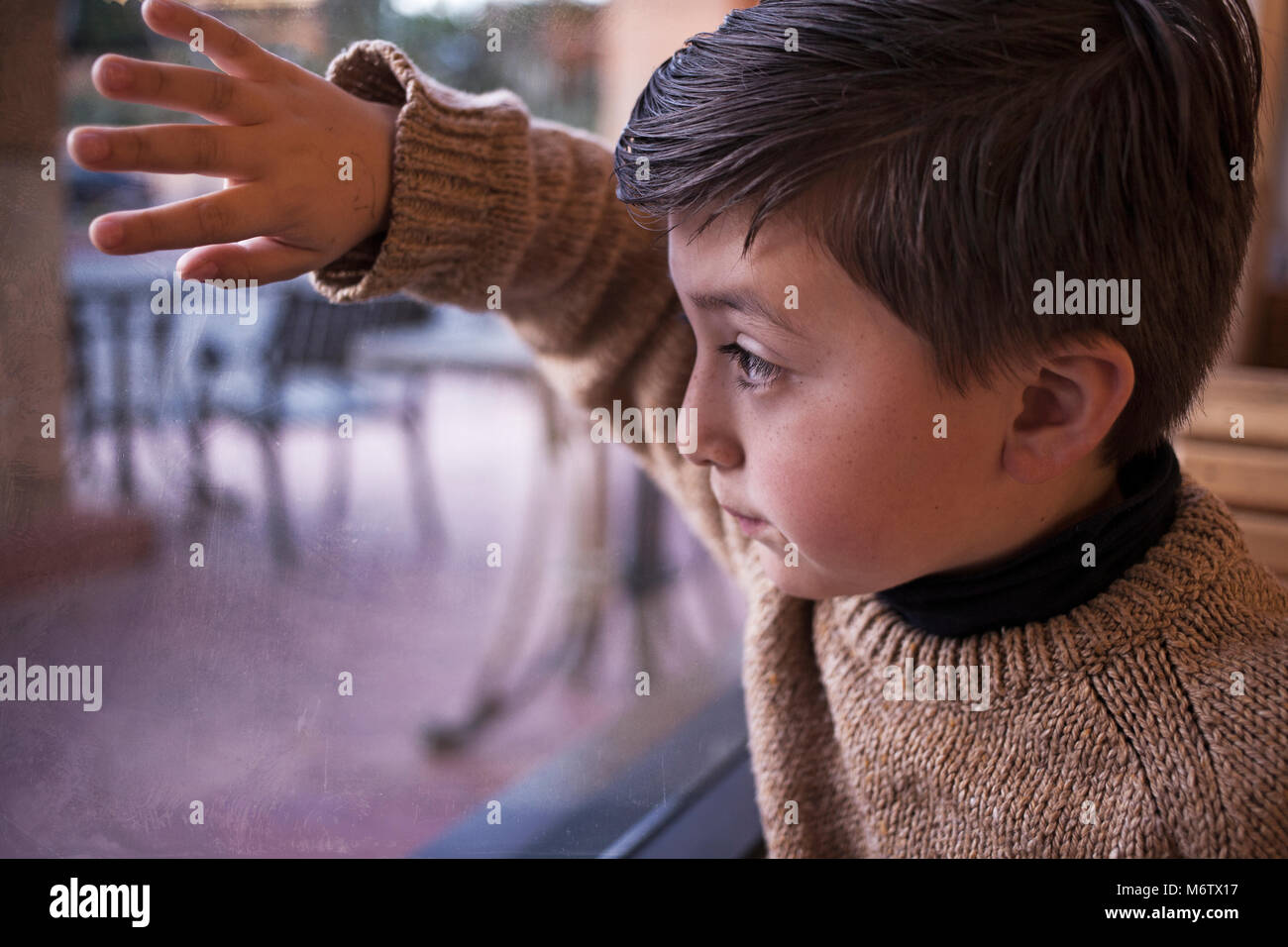 mixed race Asian Caucasian little boy with brown hair wearing brown ...
