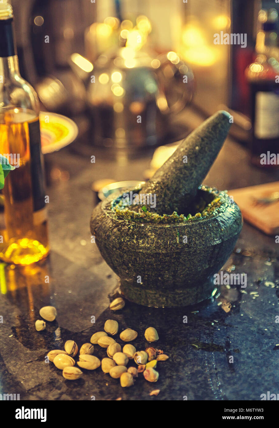 Mortar with homemade pesto in kitchen Stock Photo - Alamy