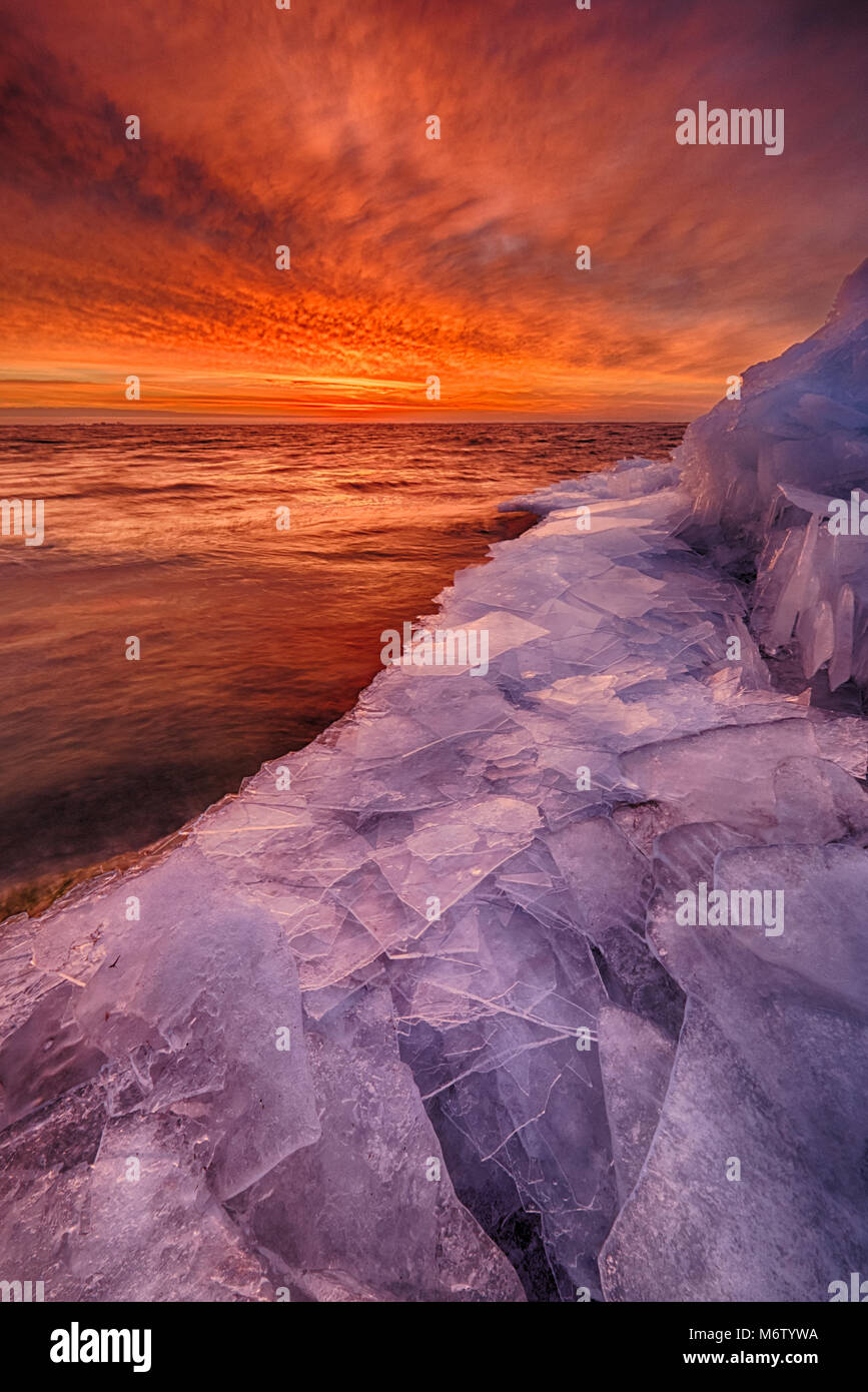 Winter ice sheets accumulate on the shores of Lake St. Clair, Michigan ...