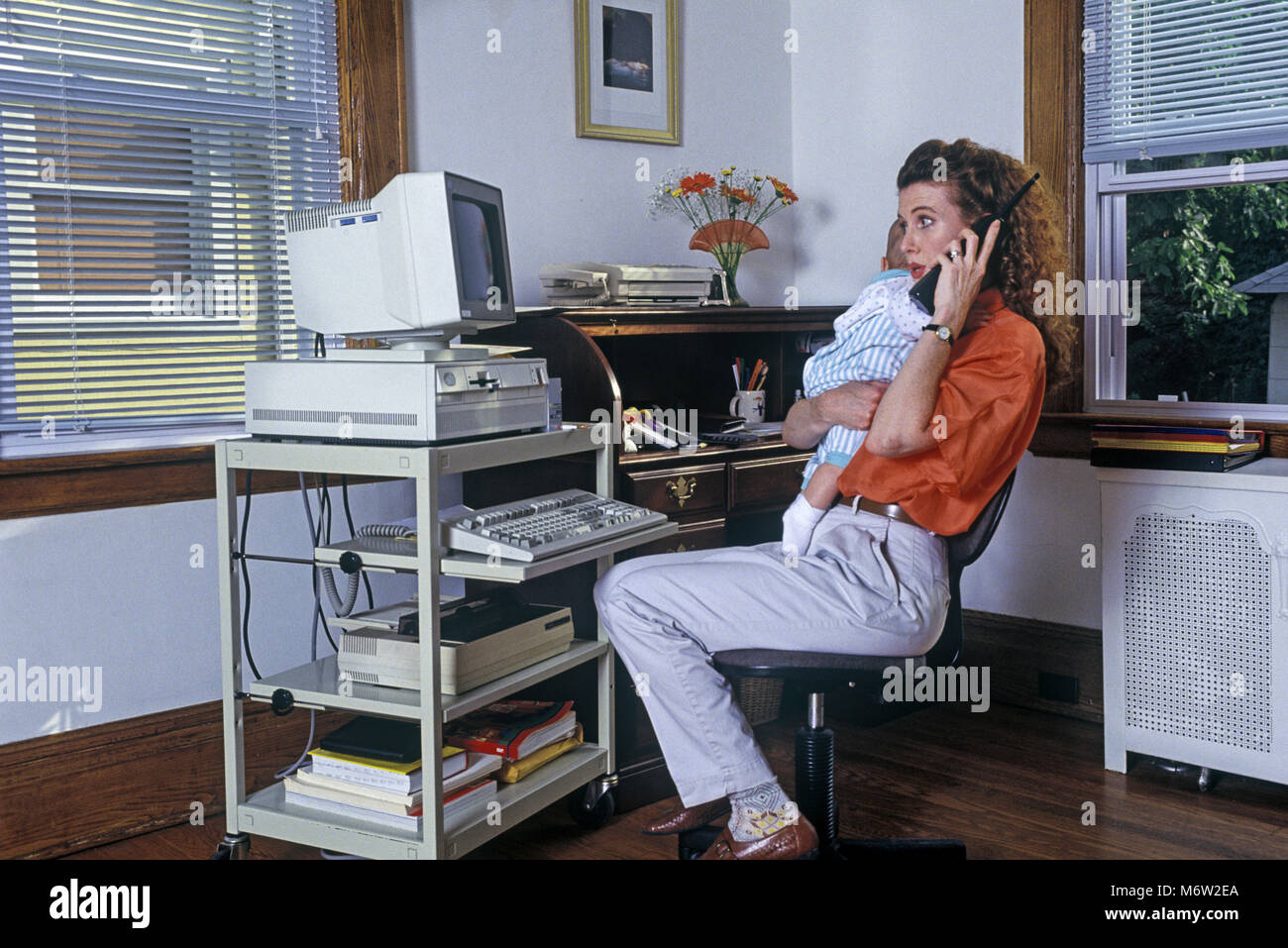 1994 HISTORICAL CAUCASIAN MOTHER HOLDING INFANT BABY SITTING BY ...