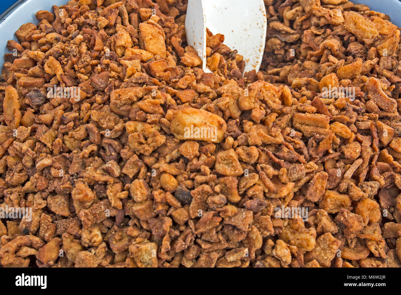 Homemade freshly picked pork greaves exposed for tasting and selling ...