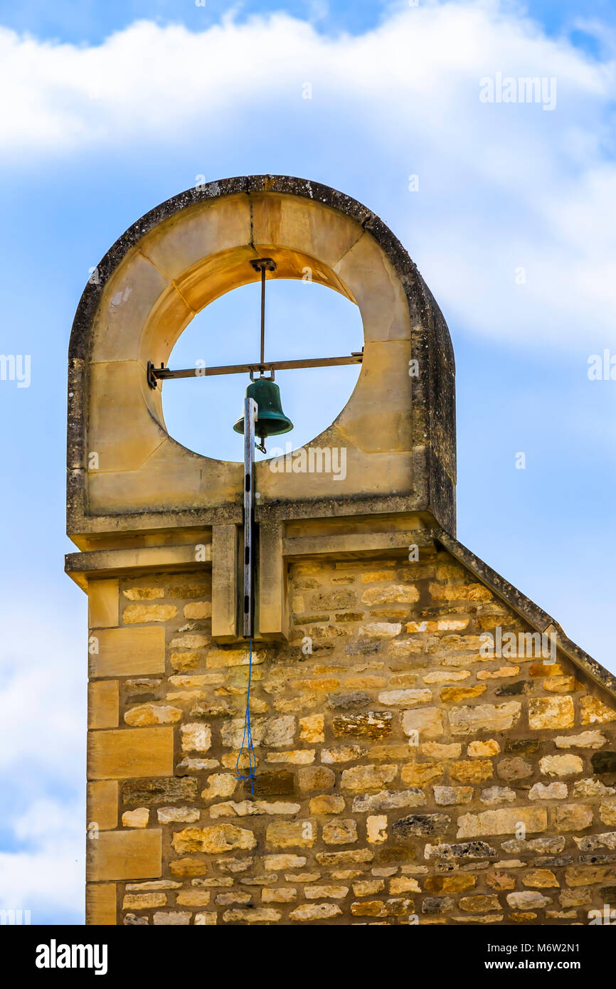 A church bell in a stone circle Stock Photo - Alamy