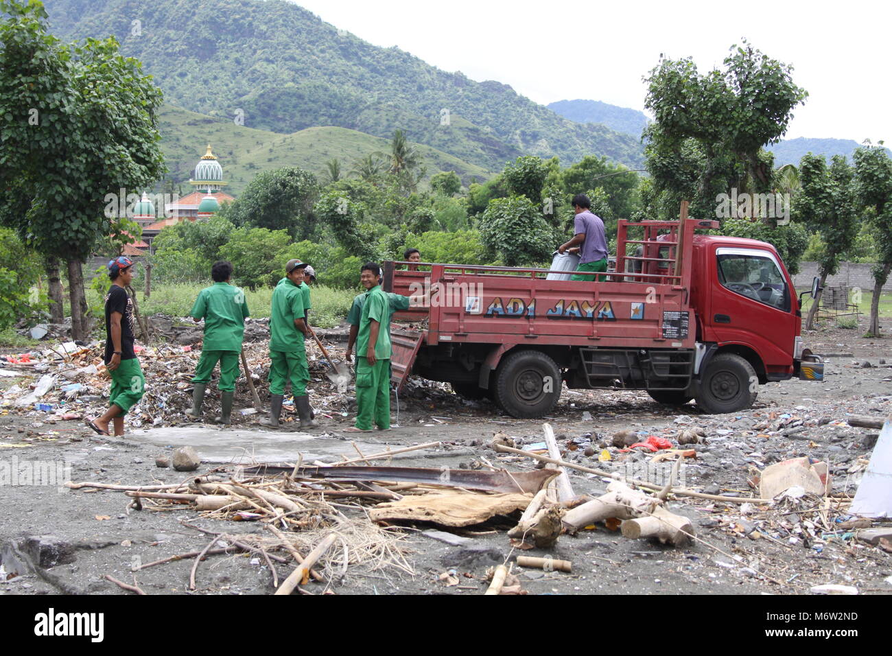 Garbage men cleaning up the place Stock Photo - Alamy