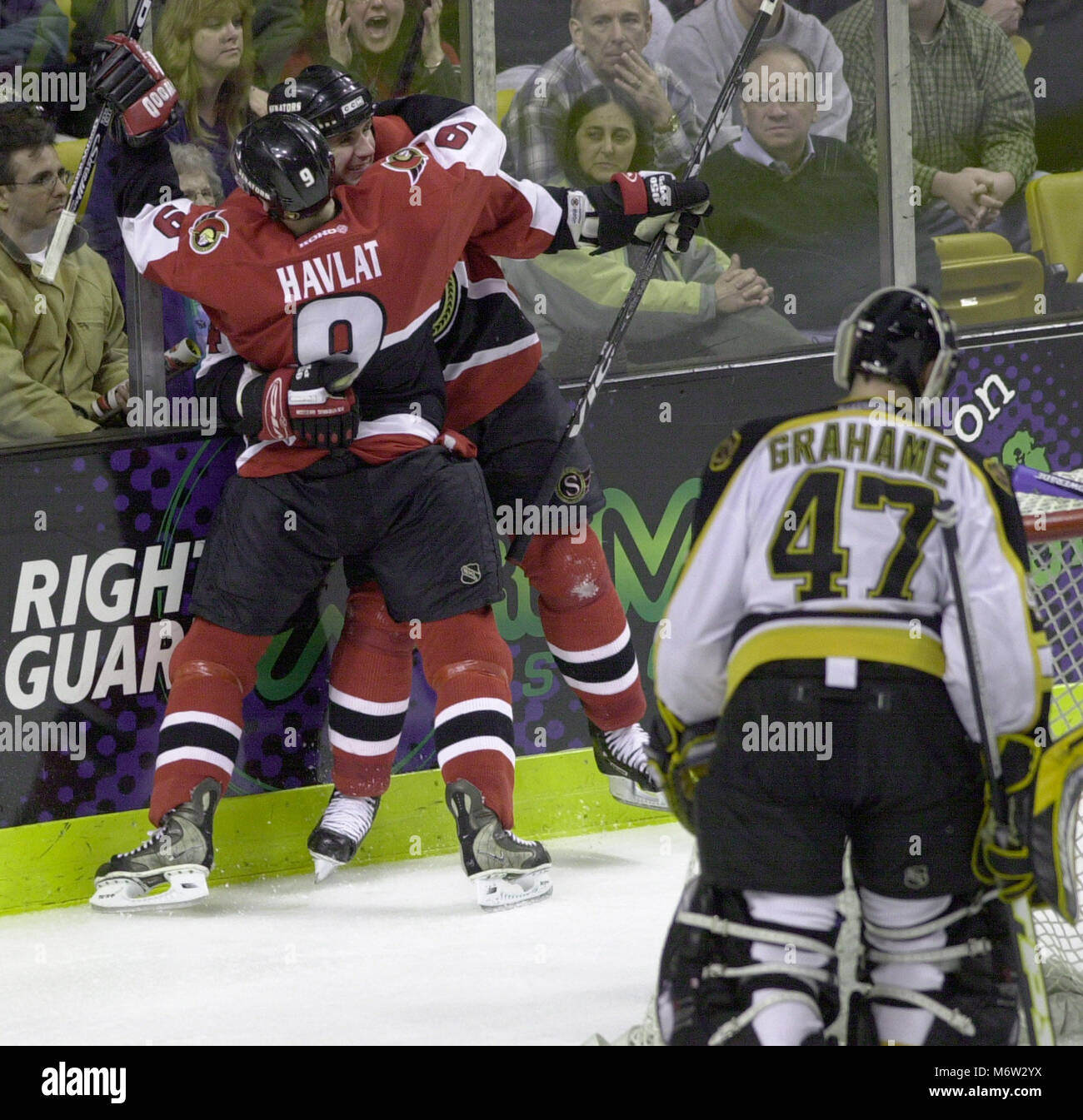 BOSTON,MA,3-8-2001. BRUINS GOALIE JOHN GRAHAME LOOKS BACK AS THE ...