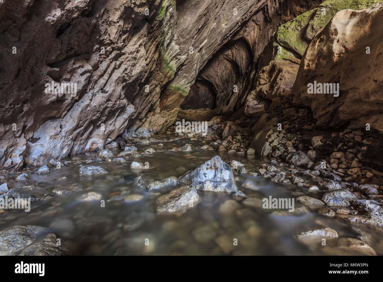 Ponicova cave entrance in the left bank of the Danube in Ciucaru Mare ...