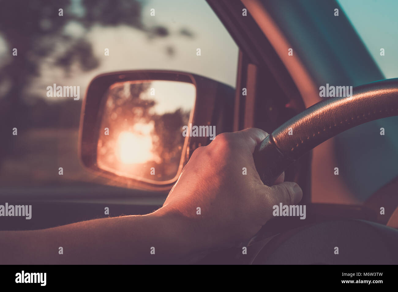 Early in the morning journey by car. Golden hour Stock Photo - Alamy
