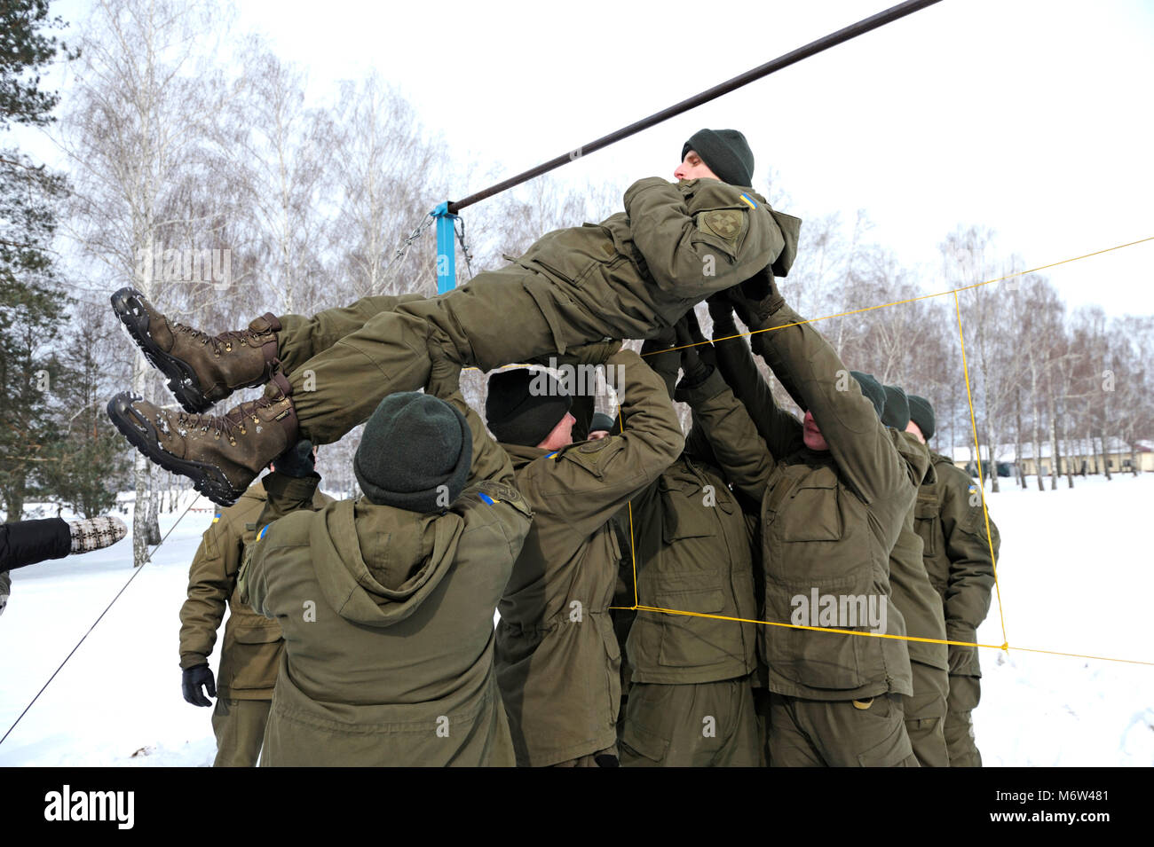 Team-building exercise doing by Ukrainian soldiers. February 1, 2018 ...