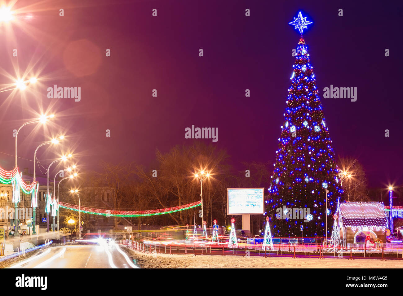 New Year's city tree in the square with illumination at night Stock ...