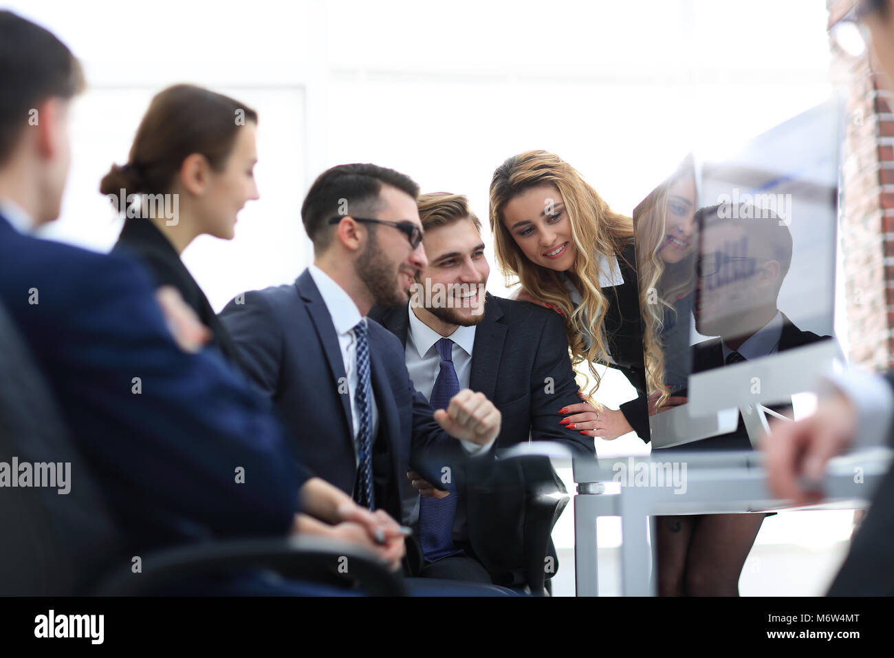 Company employees using business charts hi-res stock photography and ...