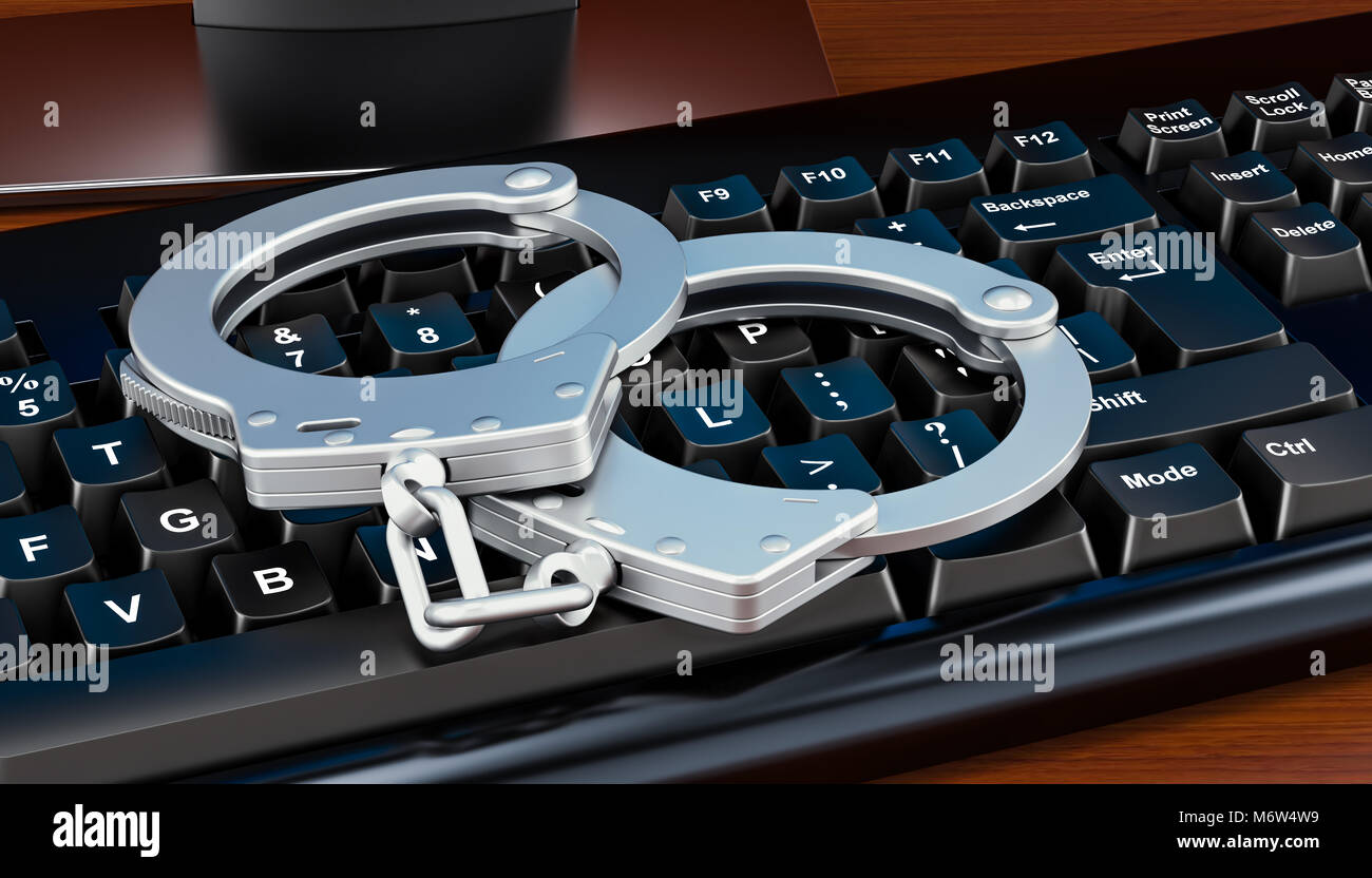 Computer keyboard with handcuffs. 3D rendering Stock Photo - Alamy