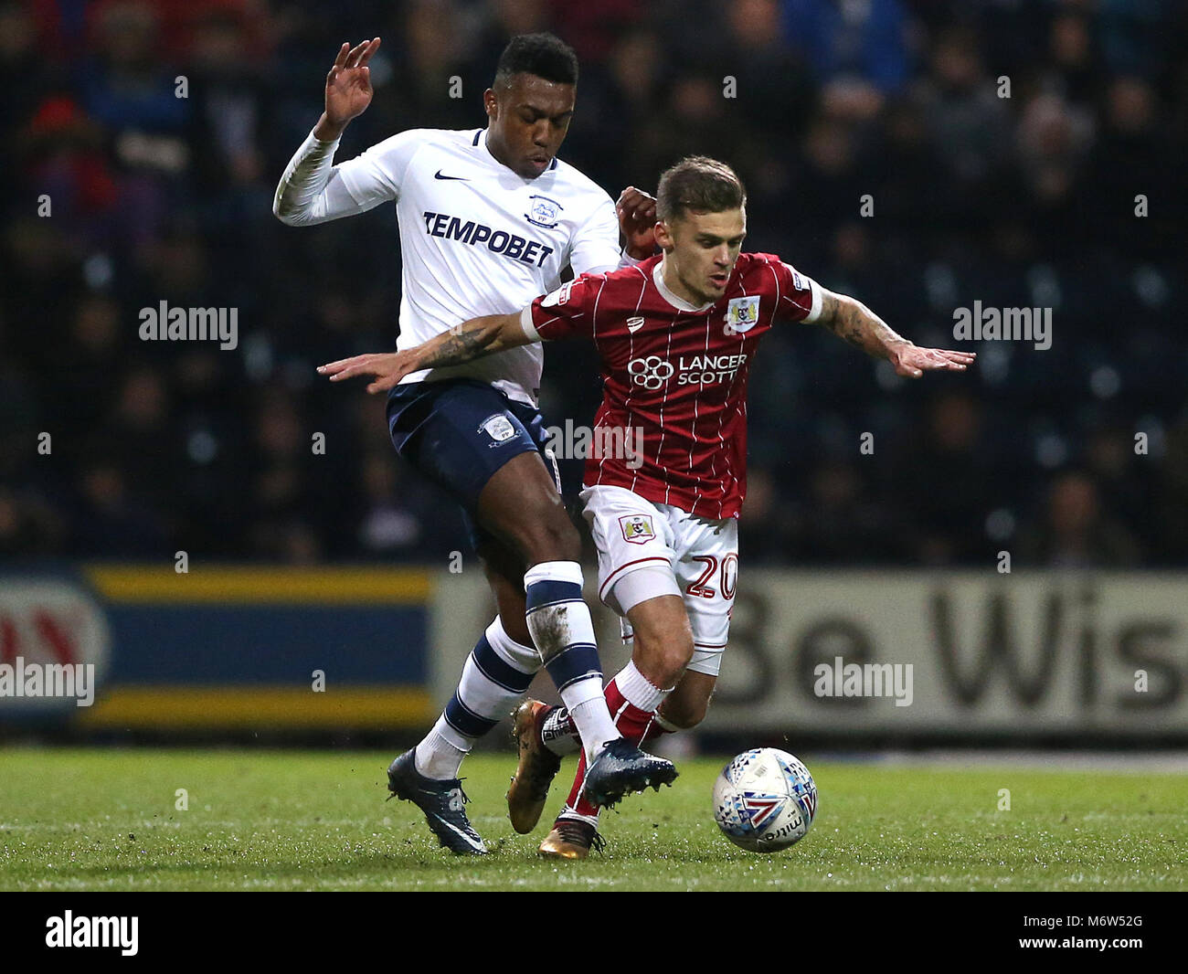 Preston North End's Darnell Fisher (left) and Bristol City's Jamie ...