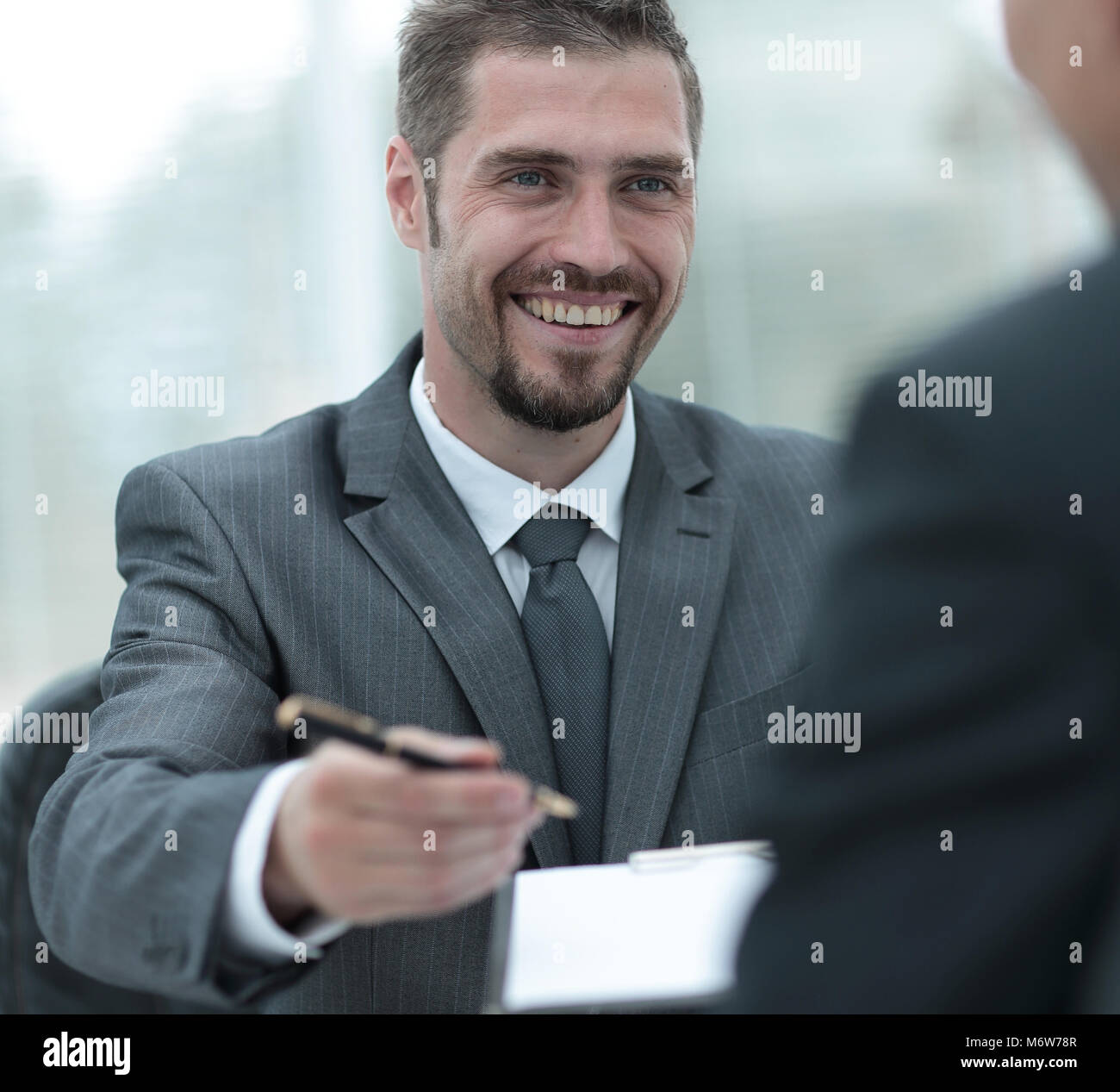 closeup.a successful businessman, signing a lucrative contract Stock ...