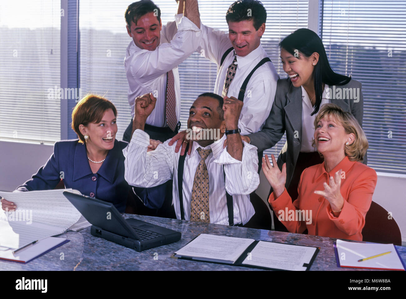 1997 HISTORICAL GROUP OF MULTI ETHNIC BUSINESS PEOPLE CELEBRATING AT ...