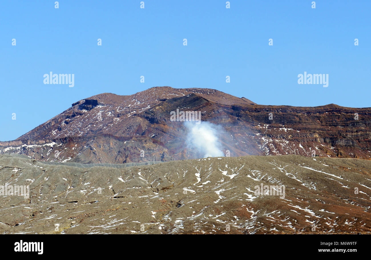 Mt. Aso volcano with the Nakadake crater spewing sulfur steam Stock ...