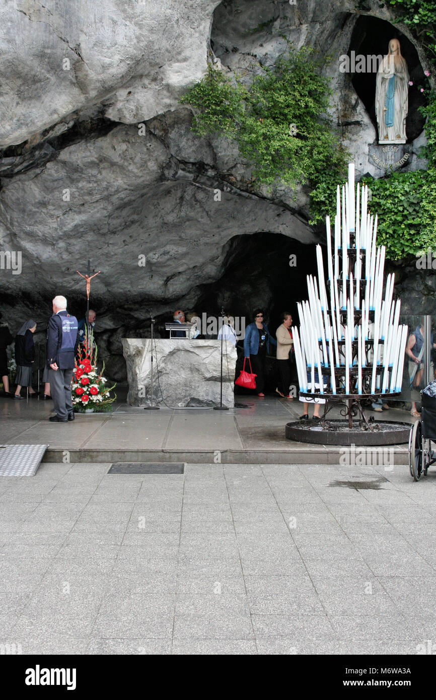 The grotto in Lourdes underneath the Basilica Stock Photo - Alamy