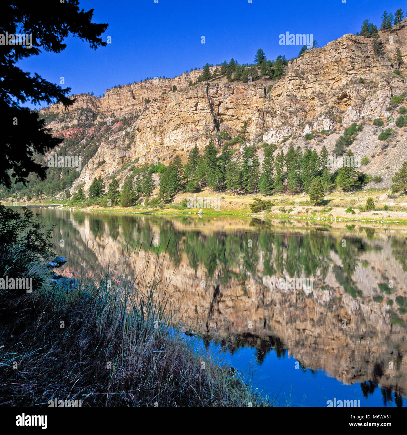 cliffs above the missouri river in a deep canyon below hauser dam near ...