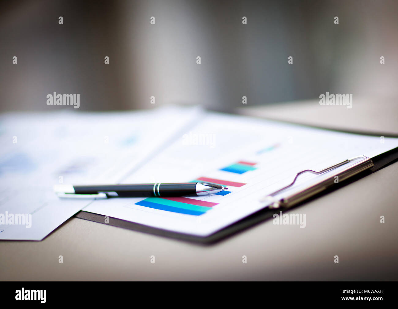 financial charts and graphs on the table Stock Photo - Alamy