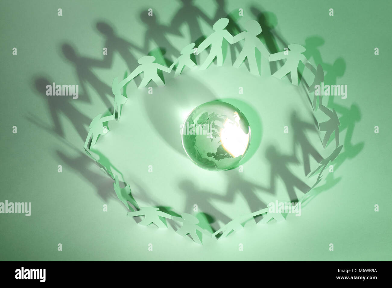 business concept.a large team of paper men standing around the Stock ...