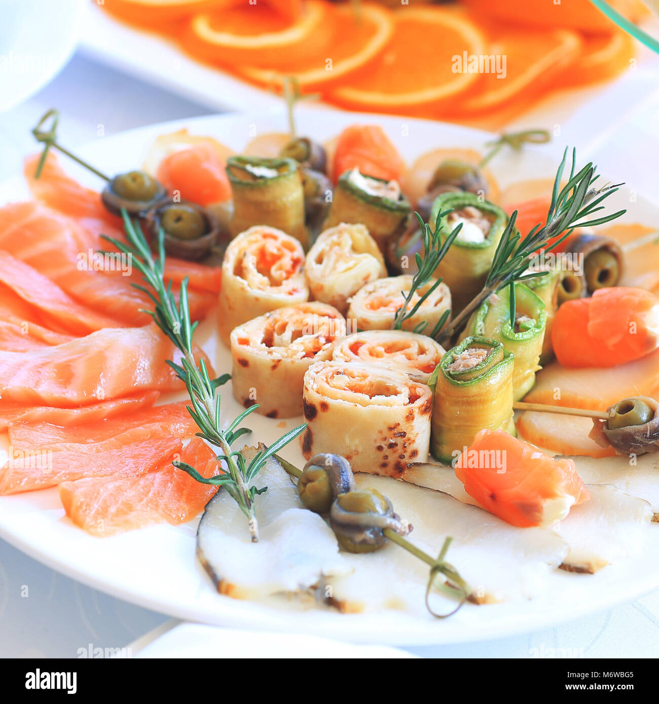 catering table set service with silverware Stock Photo - Alamy