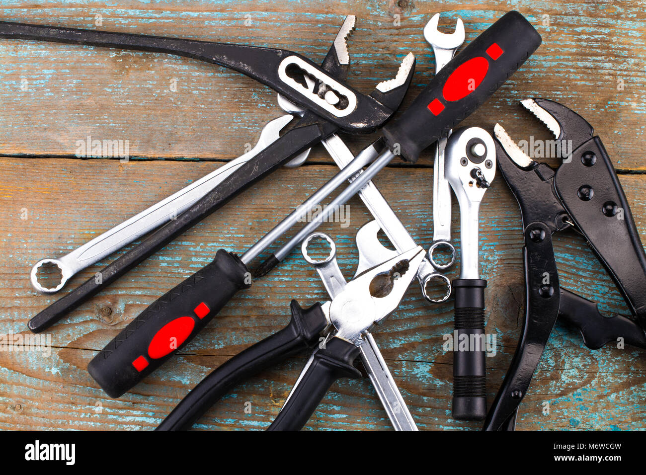 Set of tools over a wooden background Stock Photo - Alamy