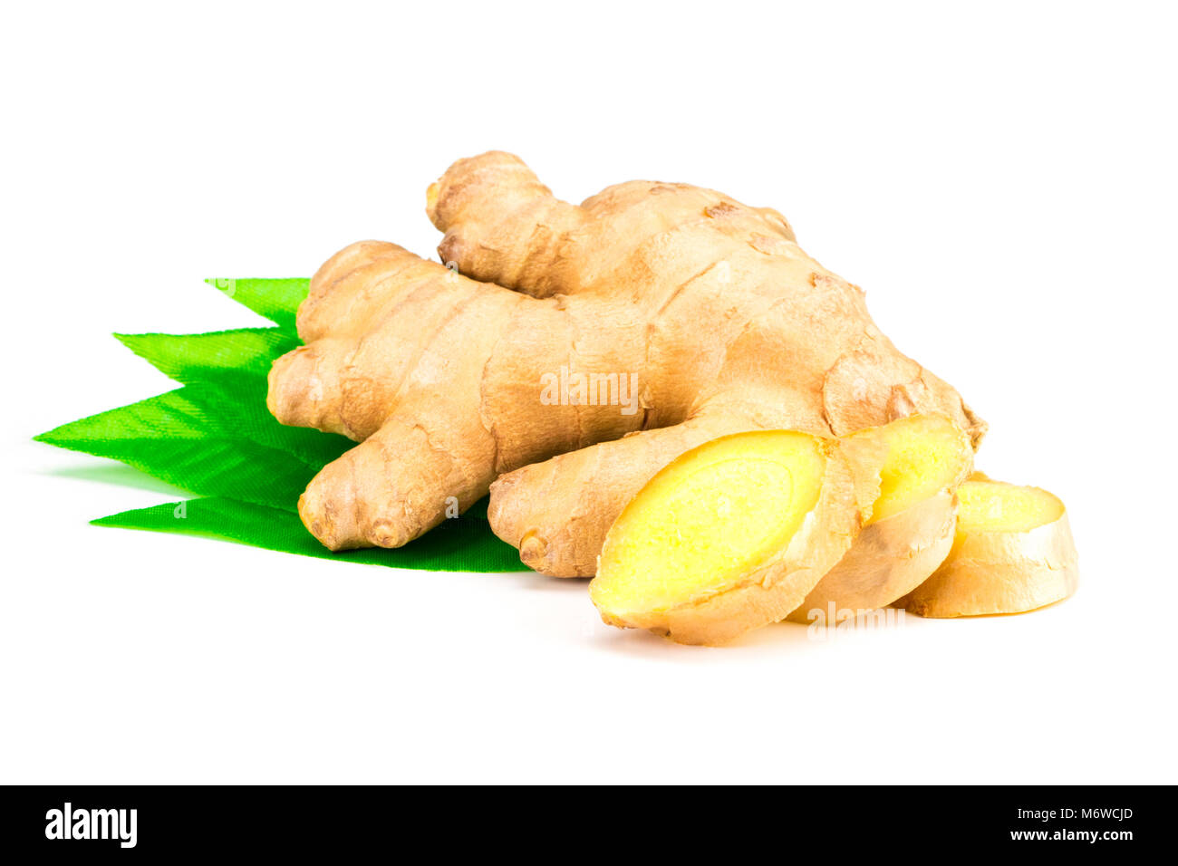 Root of ginger with leaves isolated on white background Stock Photo - Alamy
