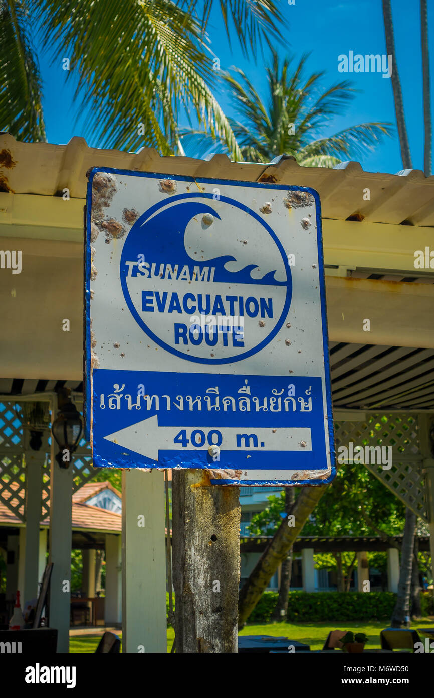 AO NANG, THAILAND - MARCH 19, 2018: Informative sign of evacuation route in case of stunami at ...
