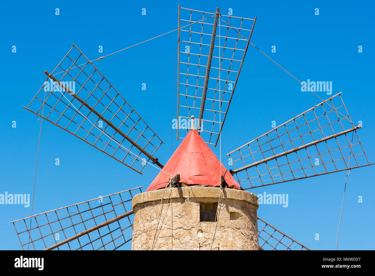 windmills at the saltworks of Trapani in Sicily in Italy Stock Photo ...