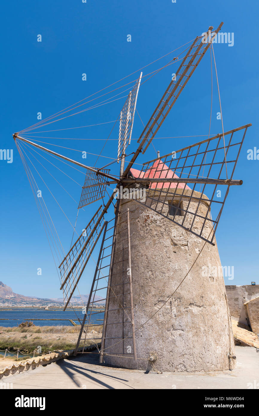 windmills at the saltworks of Trapani in Sicily in Italy Stock Photo ...