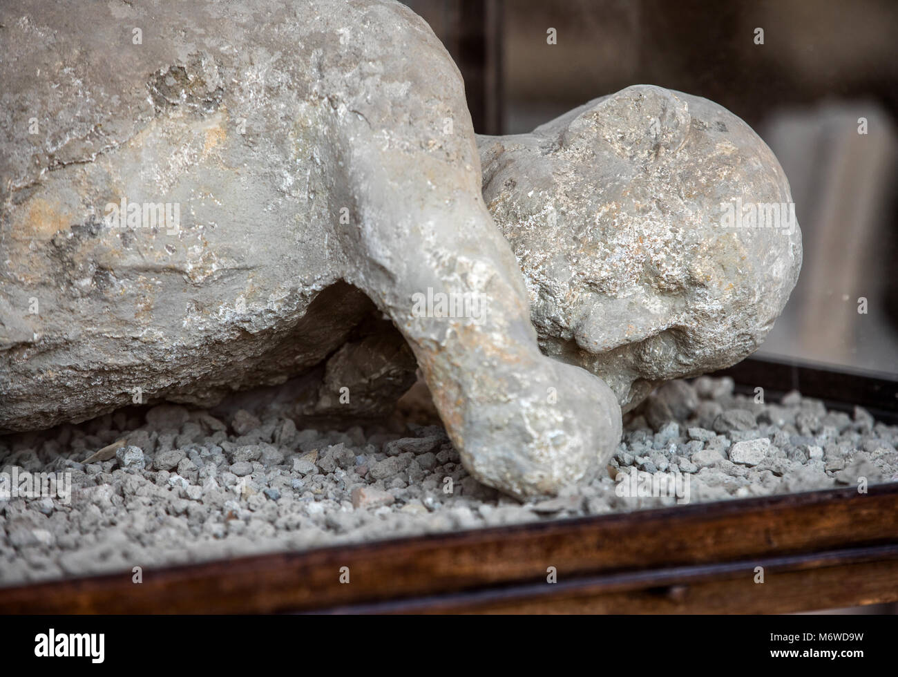 A plaster cast of a man in his last moments. Pompeii, Italy Stock Photo ...