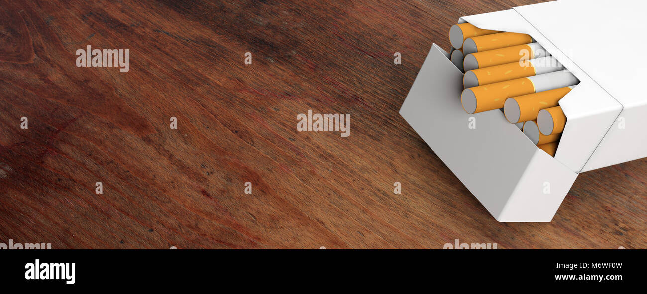 Smoking concept. White, blank cigarette pack on wooden background ...