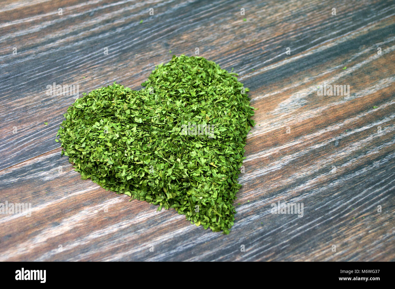 Various forms of parsley on a wooden background Stock Photo - Alamy