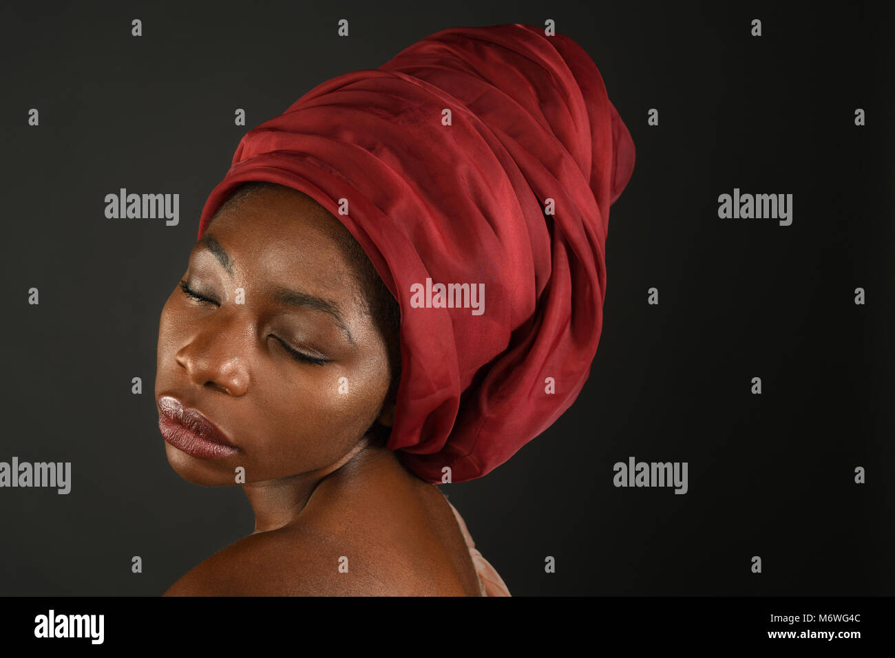 Portrait african woman red turban hi-res stock photography and images ...