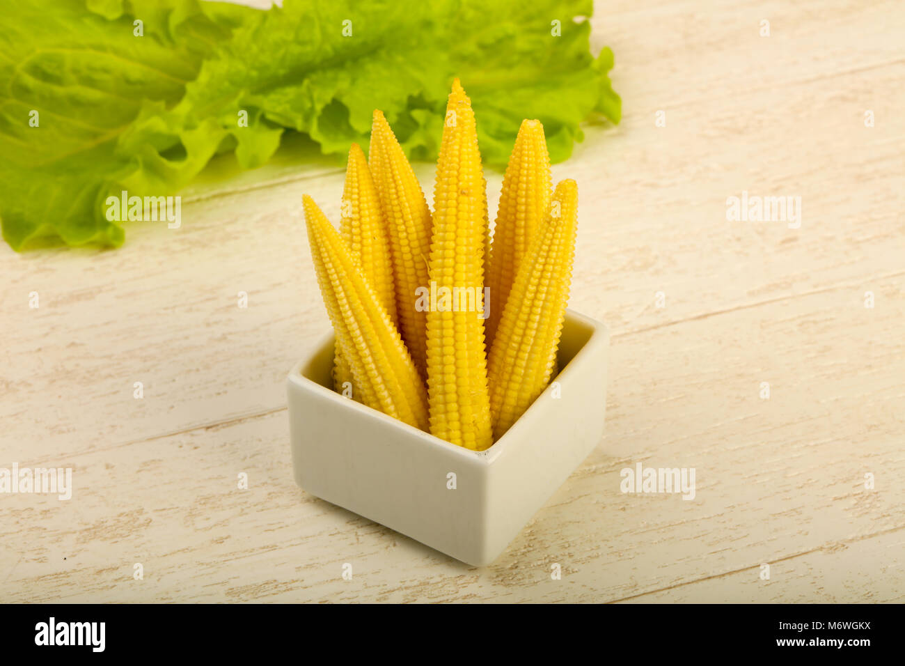 Young raw baby corn Stock Photo - Alamy
