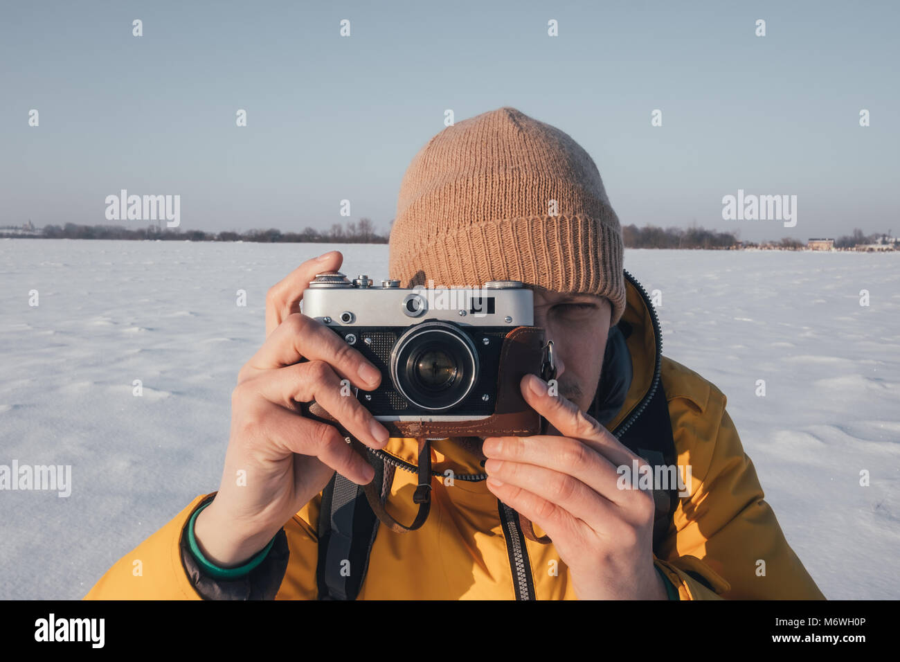 Photographer taking photo Stock Photo - Alamy