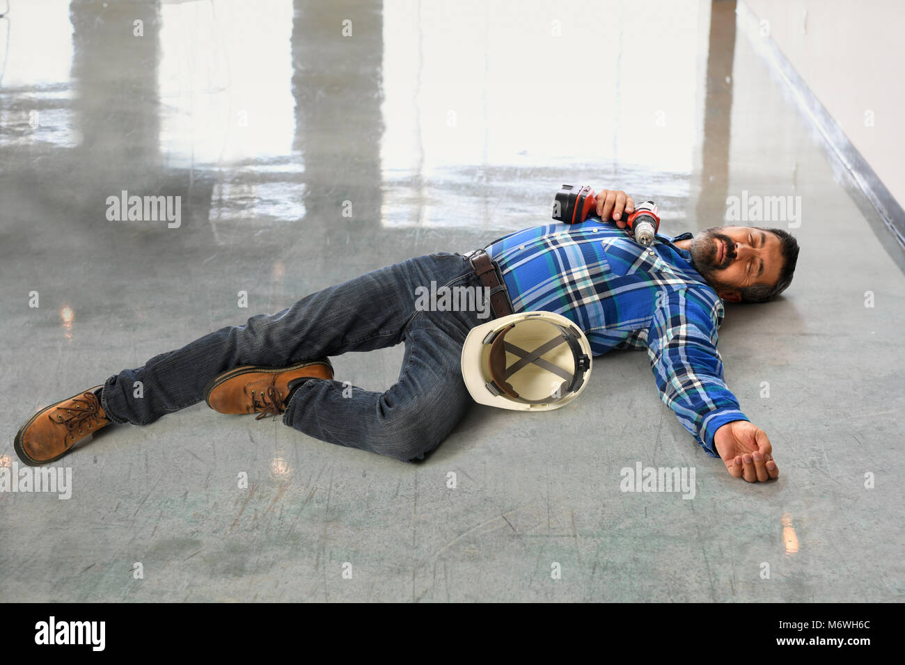 Injured person on floor hi-res stock photography and images - Alamy