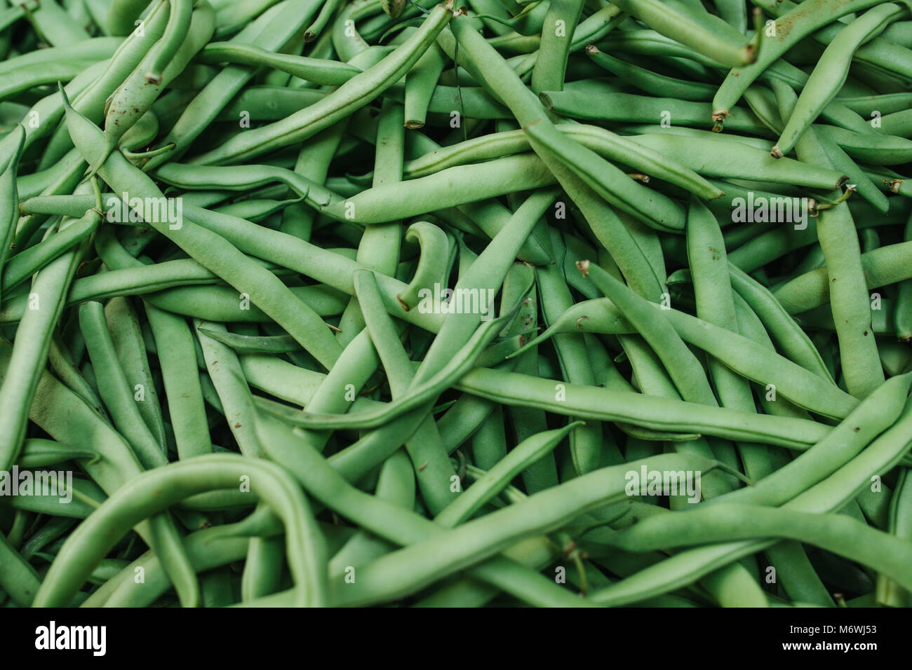 Green beans background. Natural local products on the farm market ...