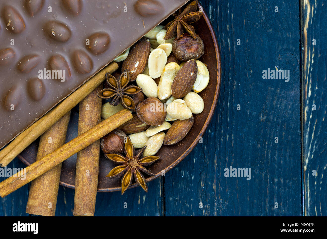 Tile of milk chocolate with hazelnut. Real milk chocolate. Tile of milk ...