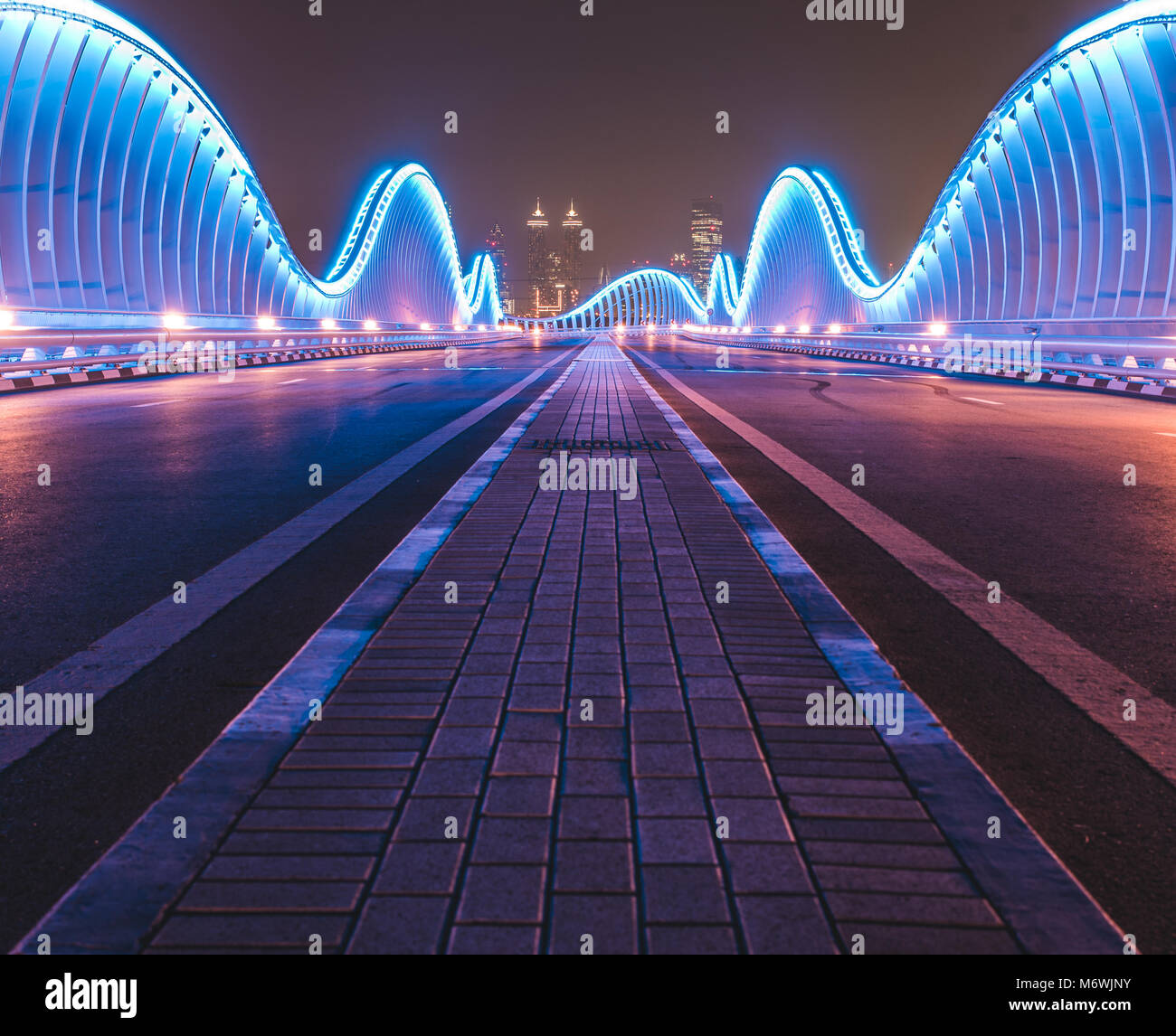 The amazing Meydan Bridge in Dubai Stock Photo - Alamy