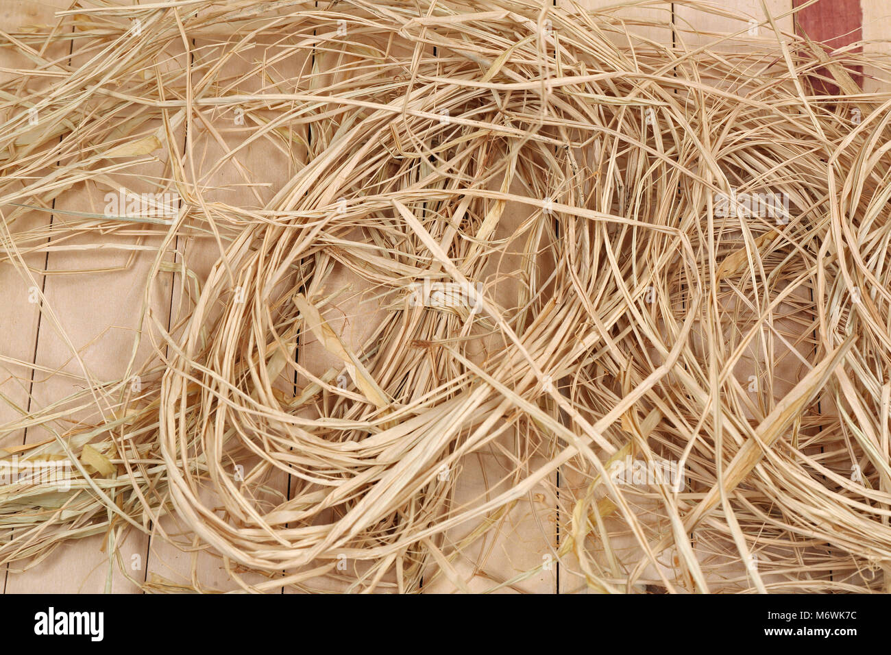 Big Bunch of Shredded Packing Straw in Wooden Box Stock Photo - Alamy