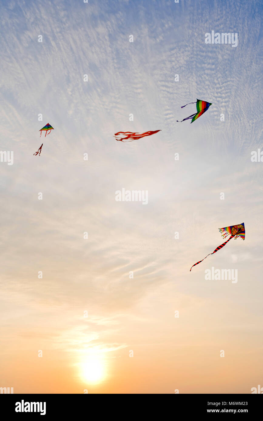 Flying kite sunset hi-res stock photography and images - Alamy