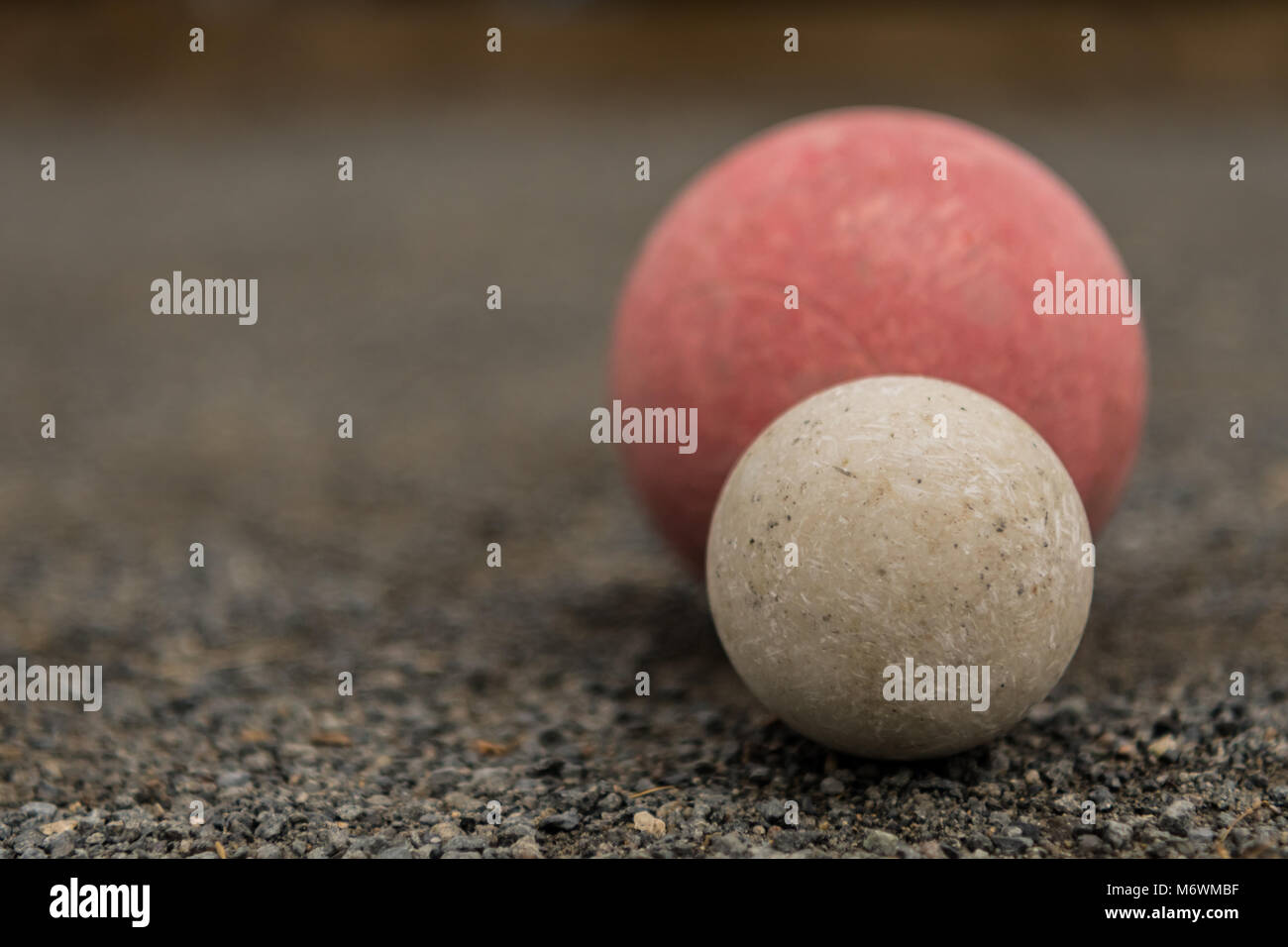 White Bocce Ball with Red Ball Close Copy Space Left Stock Photo - Alamy