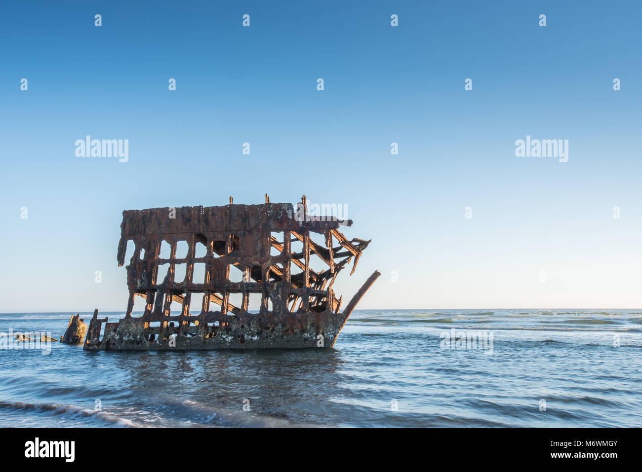 Wreck of Peter Iredale in late afternoon light Stock Photo - Alamy