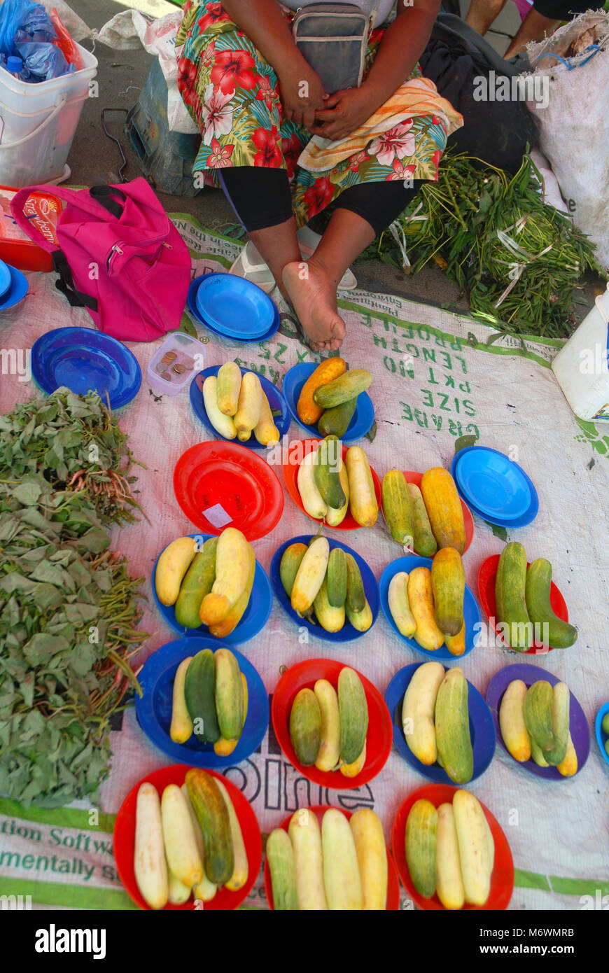 An old Fijian lady selling cucumbers at Sigatoka market, Fiji Stock ...