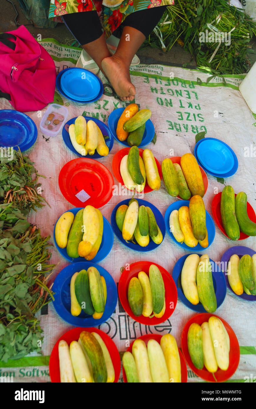 An old Fijian lady selling cucumbers at Sigatoka market, Fiji Stock ...