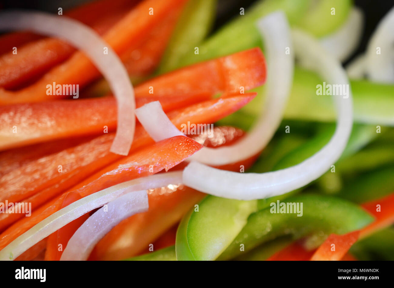 Fresh cut vegetables sliced and ready to cook Stock Photo - Alamy