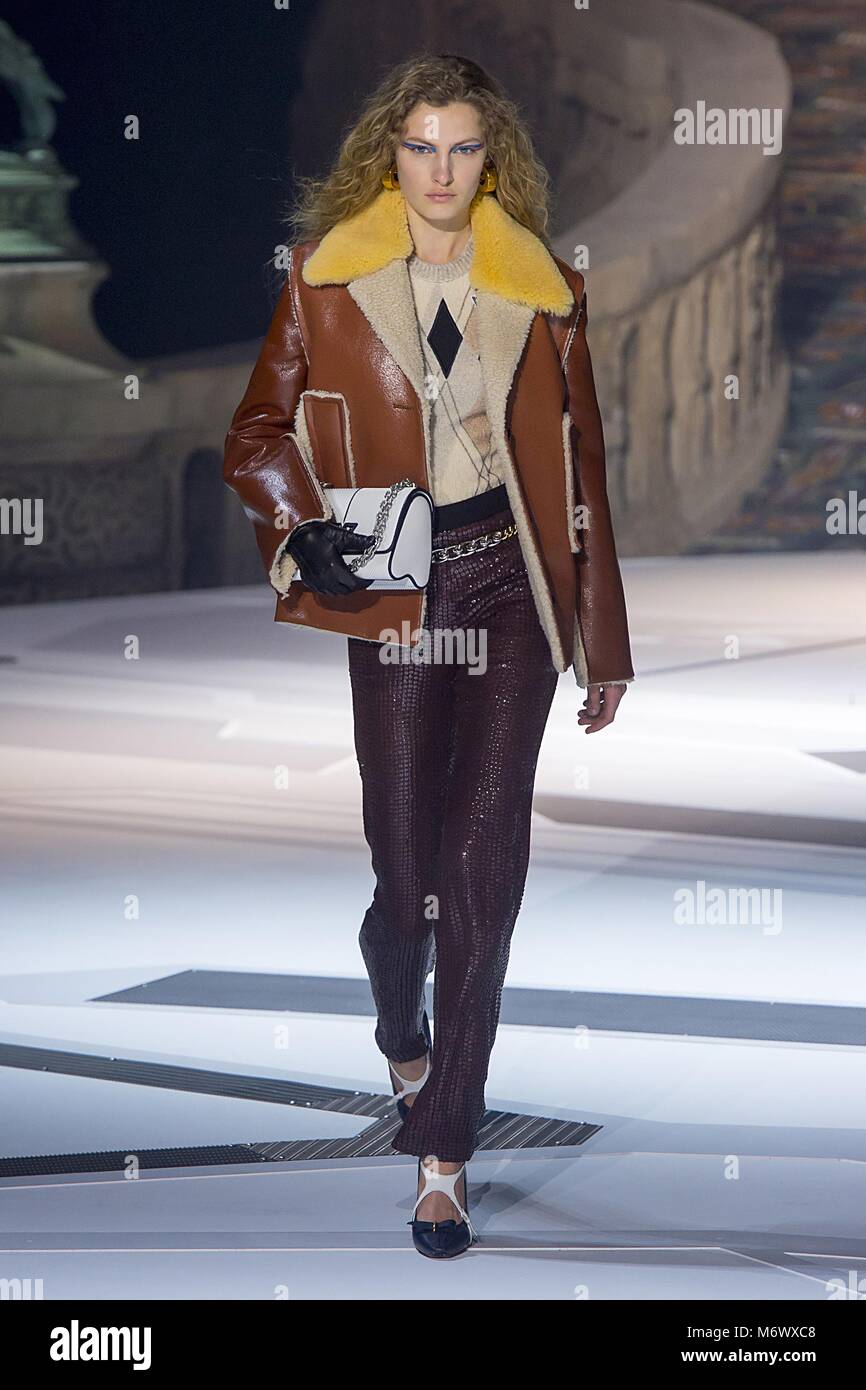 Paris, France. 6th Mar, 2018. A model presents a creation of Louis ...