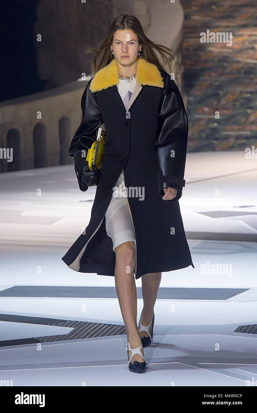 Paris, France. 6th Mar, 2018. A model presents a creation of Louis ...