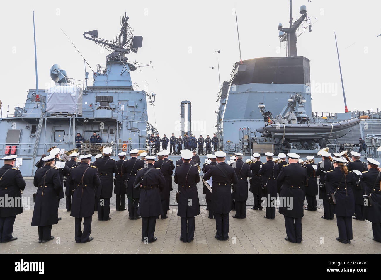 Wilhelmshaven, Germany. 07 March 2018, Navy troops stand attention ...