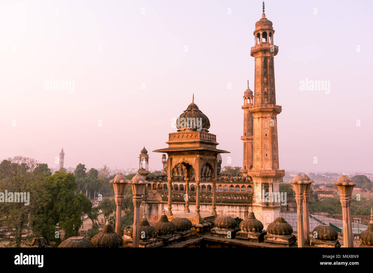 shot of the domed roof and spires or minars of Asfi mosque shot from ...